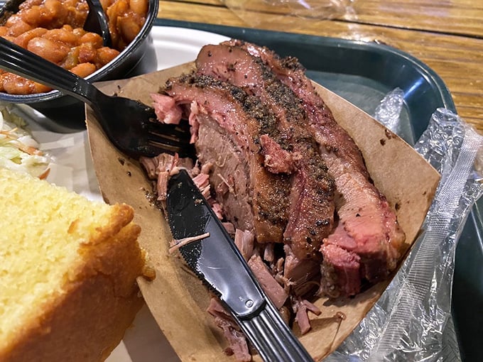 Brisket with that telltale pink smoke ring is barbecue's holy grail. This slice has the perfect bark-to-meat ratio that serious smoke aficionados dream about.