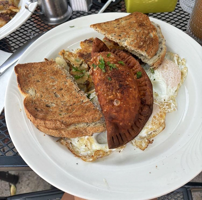 Beef empanada meets fried eggs in a cross-cultural breakfast summit that everyone wins.
