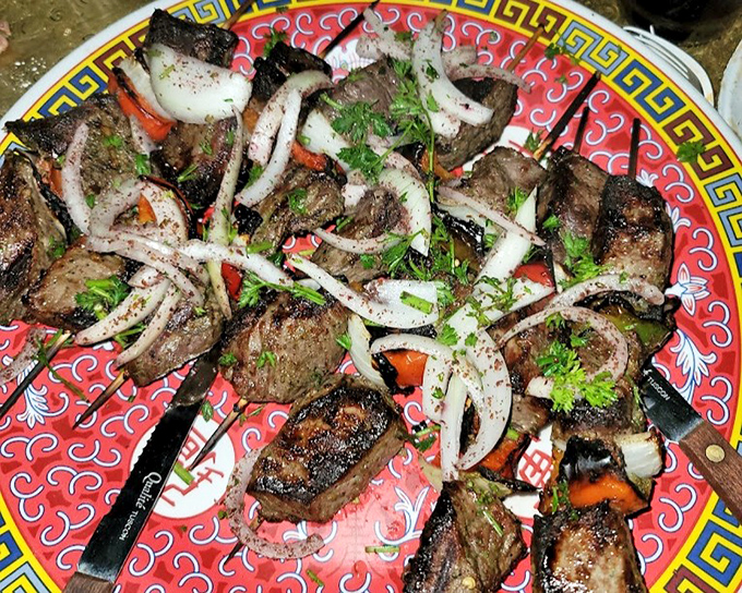 These beef kabobs aren't just grilled&mdash;they're a carnivore's dream, kissed by flames and topped with a confetti of fresh herbs and onions.