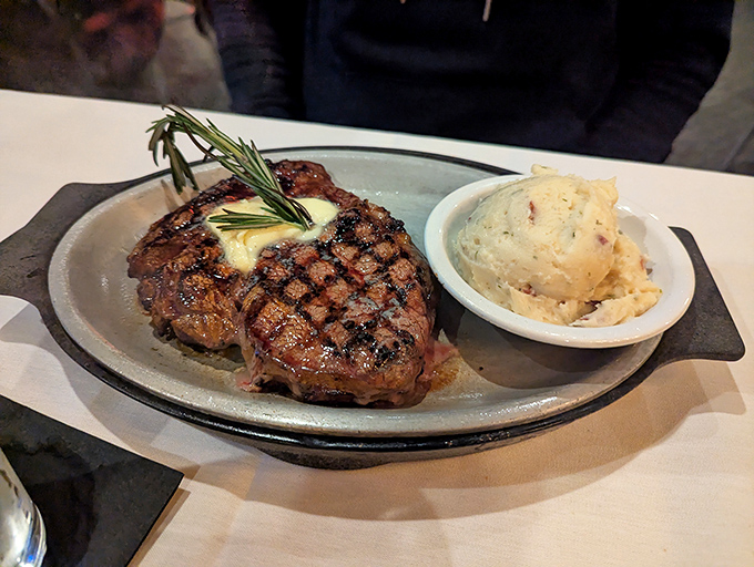 A perfectly grilled tenderloin topped with herb butter alongside creamy mashed potatoes. Some relationships are just meant to be.