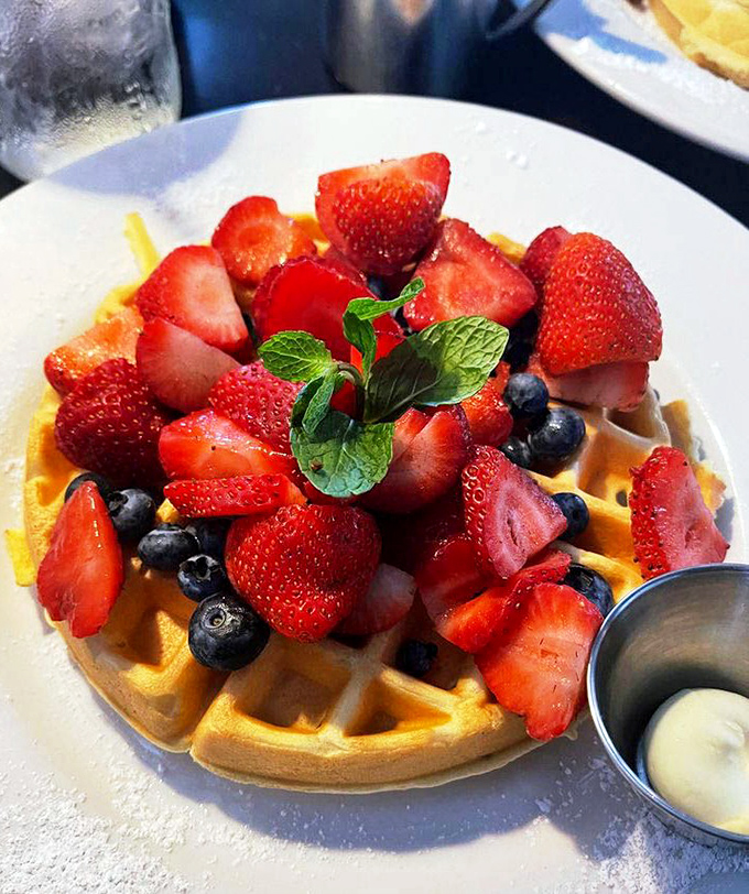 This Belgian waffle doesn't just have berries&mdash;it hosts a berry festival. The mint garnish isn't just pretty; it's the waffle's way of dressing for success.