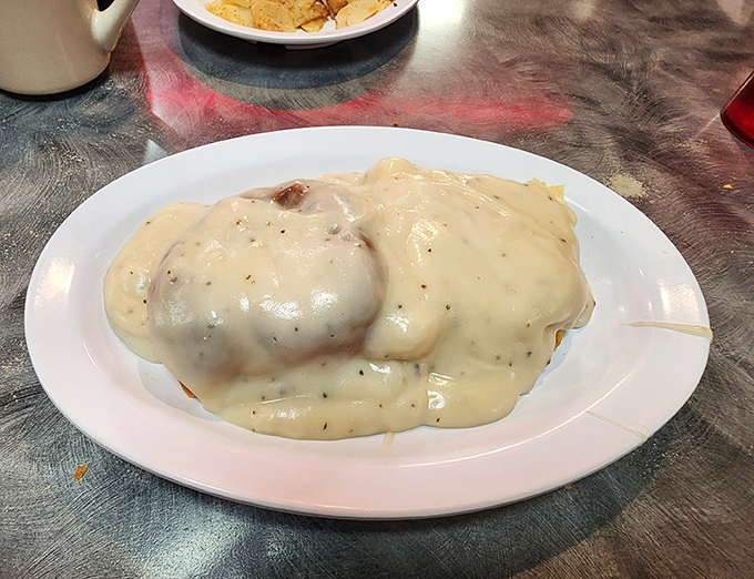 Biscuits and gravy so good they should require a permission slip. That velvety blanket of country gravy doesn't just cover the biscuits &ndash; it transforms them.