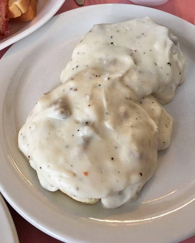 These biscuits and gravy aren't just breakfast&mdash;they're an edible security blanket that whispers, "Everything's going to be okay" with every creamy, peppery bite.