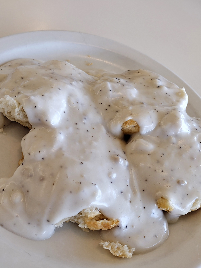 Biscuits and gravy so comforting it's like a warm hug from your grandmother, if your grandmother was a breakfast wizard.