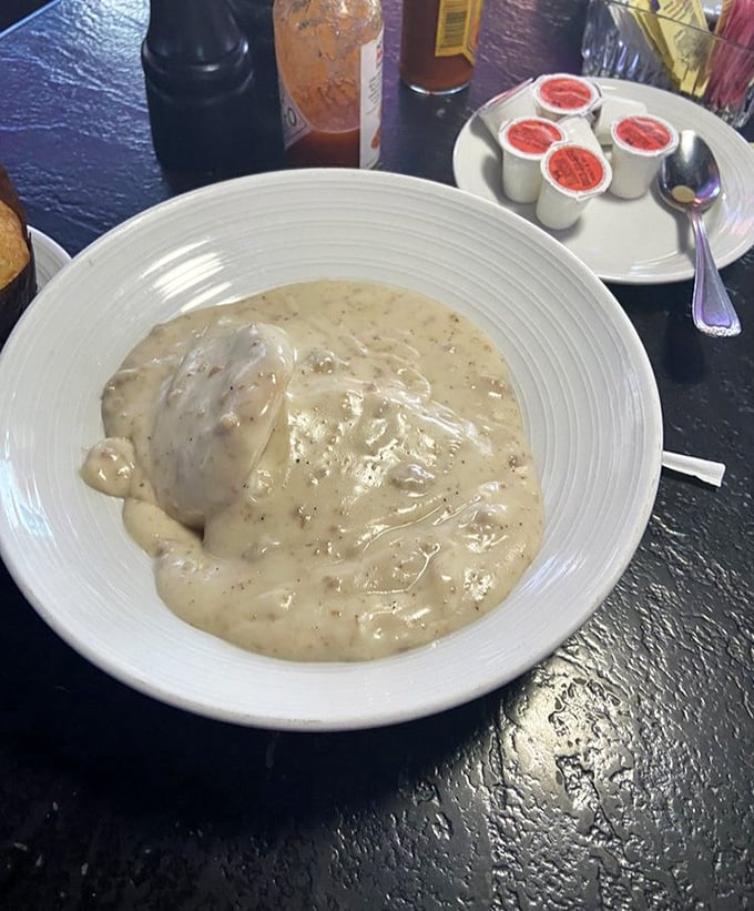 When biscuits and gravy look this creamy and comforting, you know you've found a kitchen that understands Southern soul.