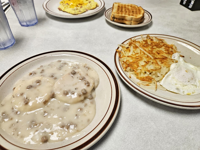 Biscuits and gravy that would make your grandmother both jealous and proud. That pepper-speckled gravy is hiding enough sausage to qualify as its own food group.