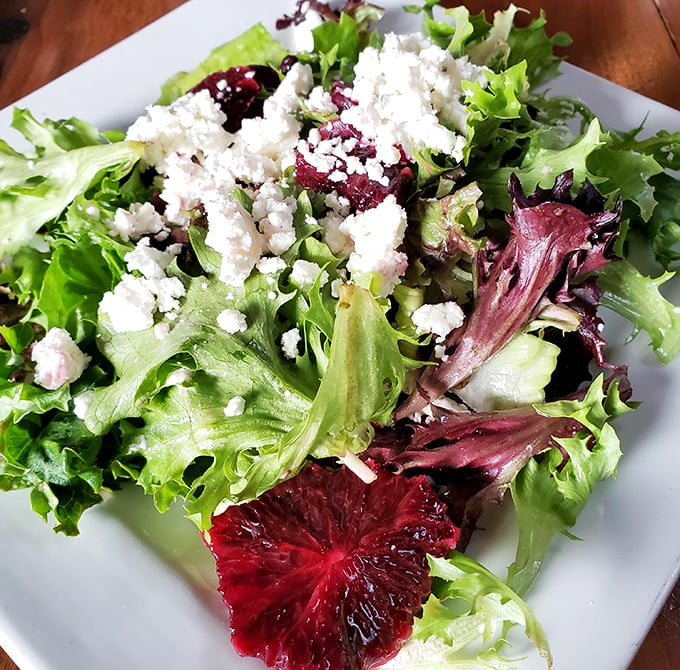 A salad that doesn't apologize for being a salad. Blood orange adds zingy brightness while the crumbled cheese brings creamy depth to every bite.
