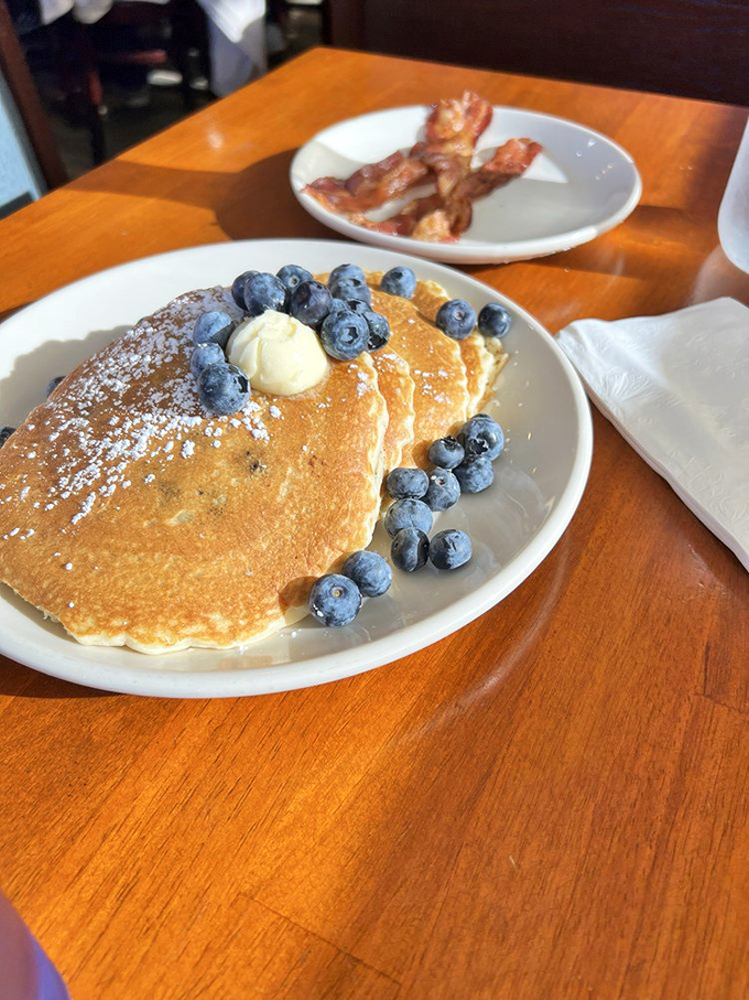 Blueberry pancakes that actually taste like blueberries&mdash;revolutionary concept! The butter melts like your resolve to "just have coffee."