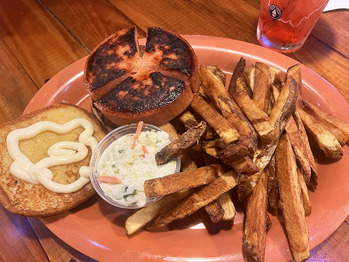 That perfectly grilled bun with a hint of char cradles comfort between bread. Those hand-cut fries aren't just a side—they're co-stars in this heartland feast.