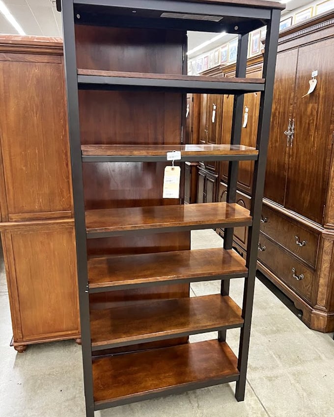 Industrial-meets-rustic bookshelves flanked by vintage wardrobes &ndash; perfect for both your paperbacks and that secret passage to Narnia.