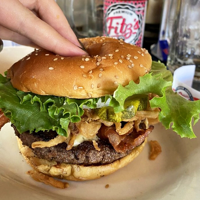 This Bourbon Burger isn't just food&mdash;it's architecture. Layers of flavor stacked so beautifully you almost feel guilty dismantling it. Almost.