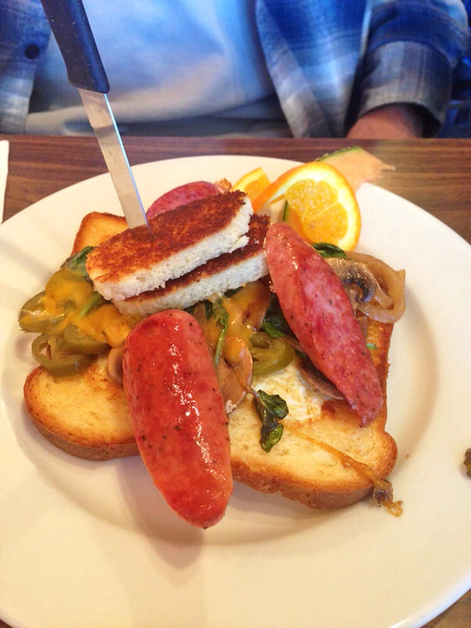 This isn't just a breakfast sandwich&mdash;it's architectural genius with sausage. The melted cheese and perfectly toasted bread create the morning masterpiece you didn't know you needed.