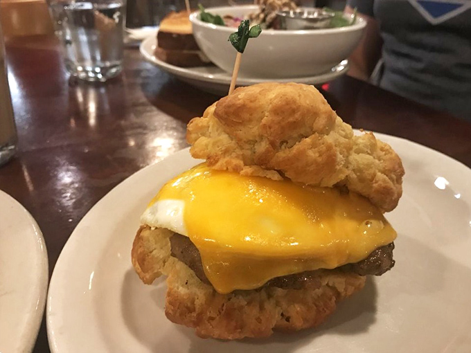Architecture matters in breakfast sandwiches too. This golden-crowned biscuit creation has the structural integrity of a cathedral and twice the soul.