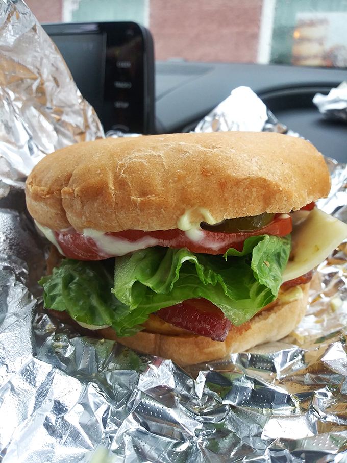 This isn't just a sandwich; it's architecture with lettuce, tomato, and cheese on fresh-baked bread that puts grocery store loaves to shame.