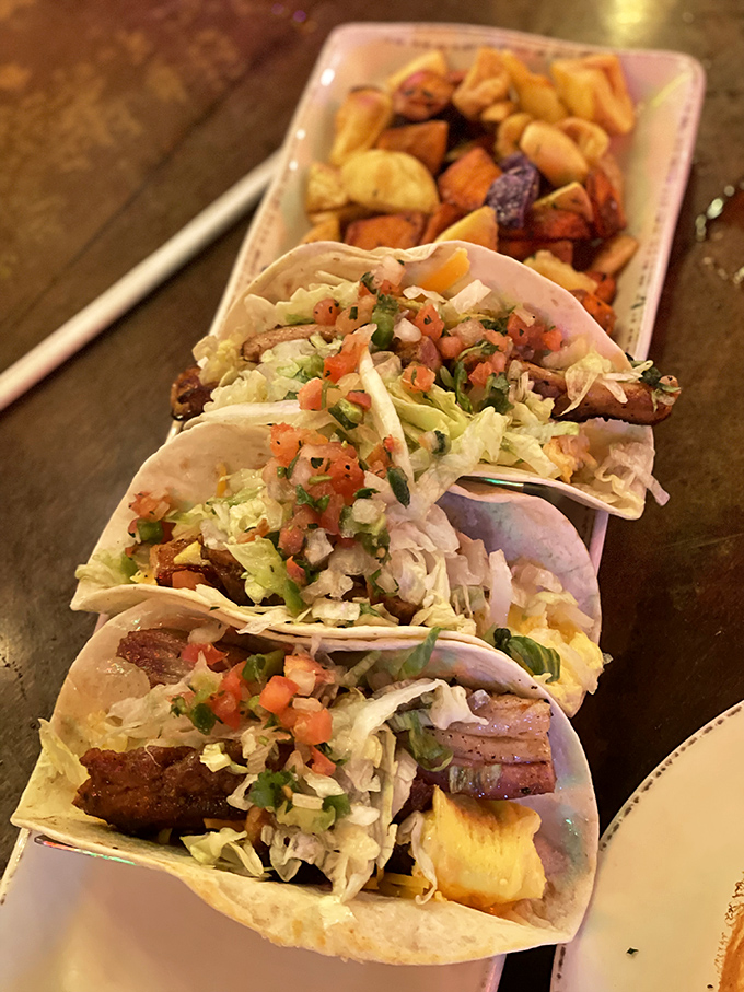 Breakfast tacos lined up like soldiers ready to march straight into your heart and permanently relocate there.