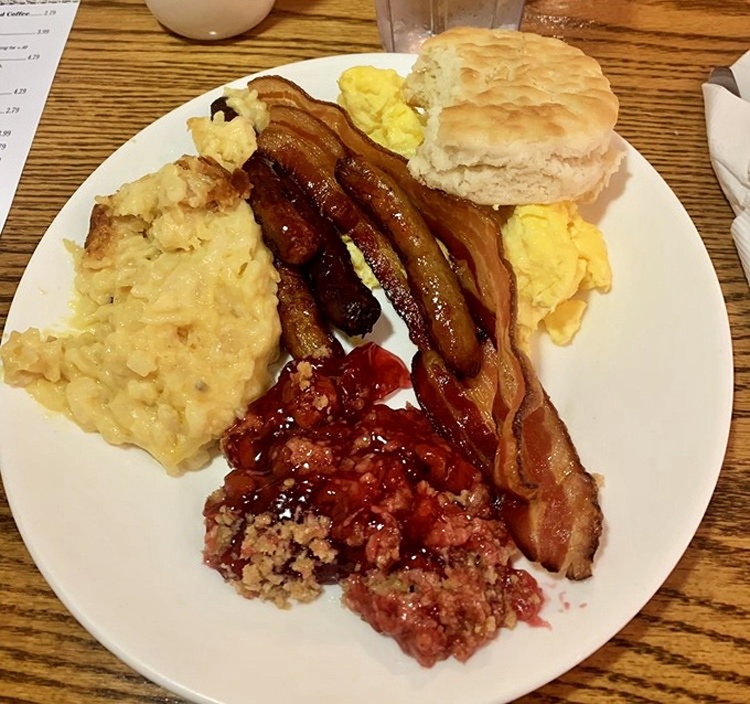 Breakfast that means business &ndash; scrambled eggs, bacon, and what might be the world's most perfect biscuit waiting for your attention.