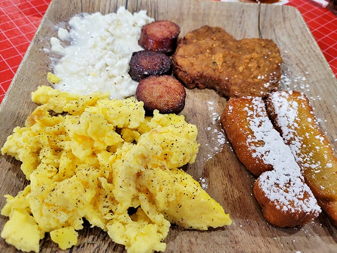 Breakfast of champions! Eggs, sausage, and what appears to be a cornmeal pancake - proof that barbecue joints often hide breakfast talents.