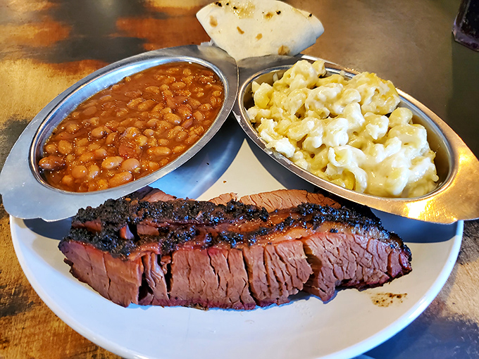 Brisket, beans, and mac & cheese&mdash;the holy trinity of barbecue satisfaction that proves comfort food is the universal language of happiness.