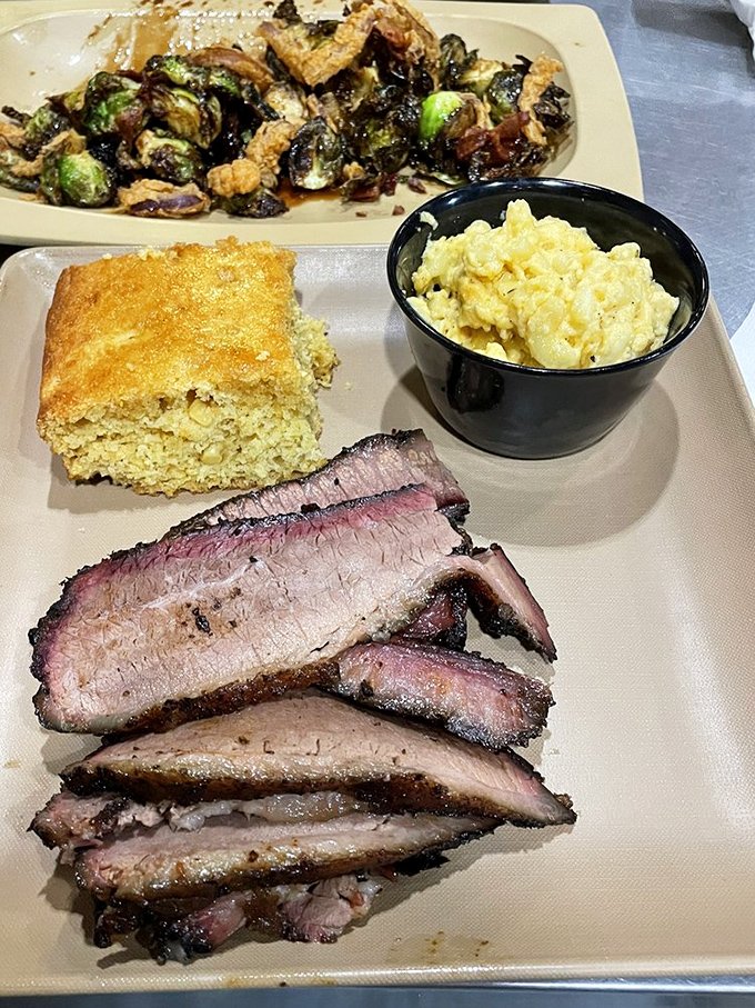 Brisket with that coveted pink smoke ring, cornbread that crumbles just right, and mac & cheese that's clearly been taking its vitamins.
