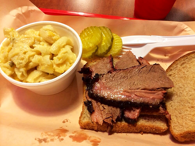Brisket so tender it practically surrenders at the sight of a fork, paired with mac and cheese that's comfort in a cup.
