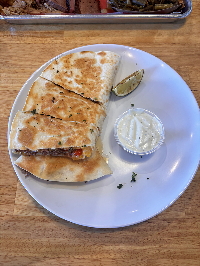 Quesadillas reimagined through the smoky lens of barbecue. That little cup of sauce is about to elevate everything to new heights.