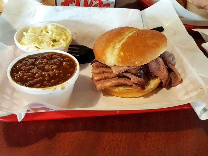 The brisket sandwich: where smoke-kissed beef meets pillowy bun in a relationship that was clearly meant to be.