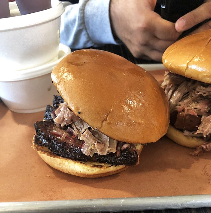 This isn't just a sandwich; it's a brisket revelation on a bun &ndash; layers of smoky, tender meat that makes you wonder why you'd eat anything else.