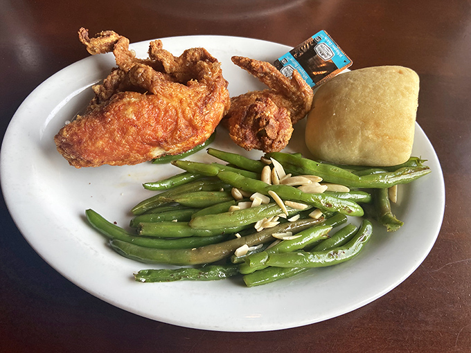 Broasted chicken that would make your grandmother both jealous and proud, paired with green beans that actually taste like vegetables should.