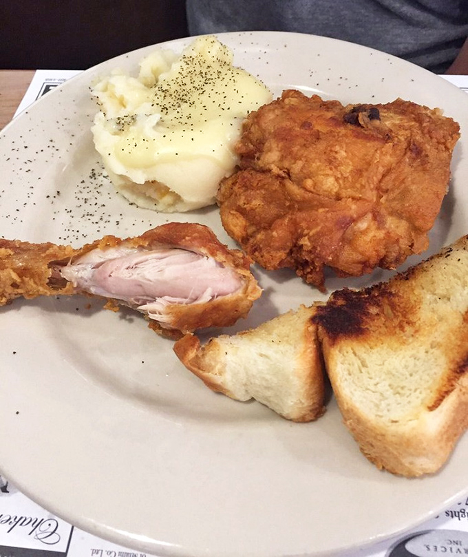 The holy trinity of comfort food &ndash; golden broasted chicken, cloud-like mashed potatoes, and toast for structural support.