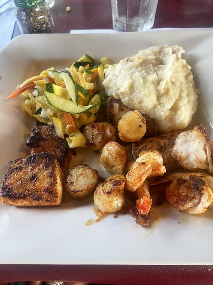 The seafood platter that answers the eternal question: "Why choose one when you can have it all?" Ocean bounty, perfectly prepared.