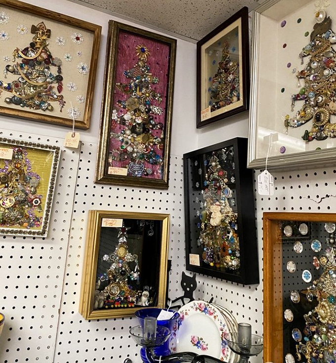 Jewelry transformed into framed art &ndash; someone's grandmother's brooches and costume pieces now preserved as glittering Christmas trees that never need watering.