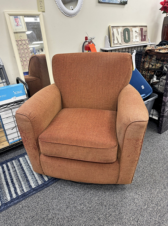 This cozy rust-colored armchair isn't just furniture&mdash;it's a time machine to Sunday afternoons with crosswords and coffee. Comfort at a fraction of retail.