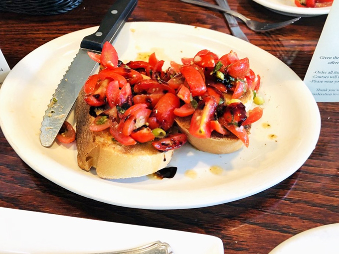 Bruschetta piled high with tomatoes and balsamic glaze, because sometimes simple ingredients create the most extraordinary moments on your tongue.