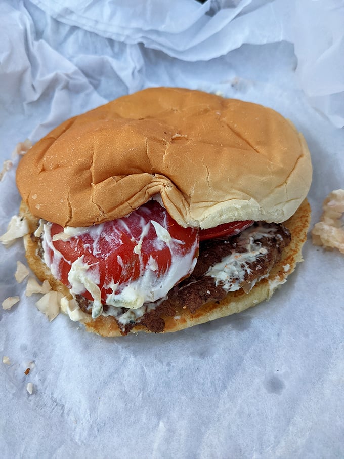 Meet the burger that launched a thousand road trips. That melty cheese blanket is not messing around with your hunger.