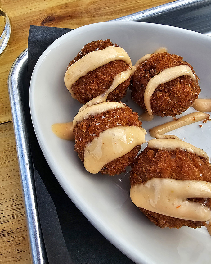 These golden-fried croquettes with creamy sauce aren't just appetizers &ndash; they're the opening act that deserves a standing ovation before the main event.