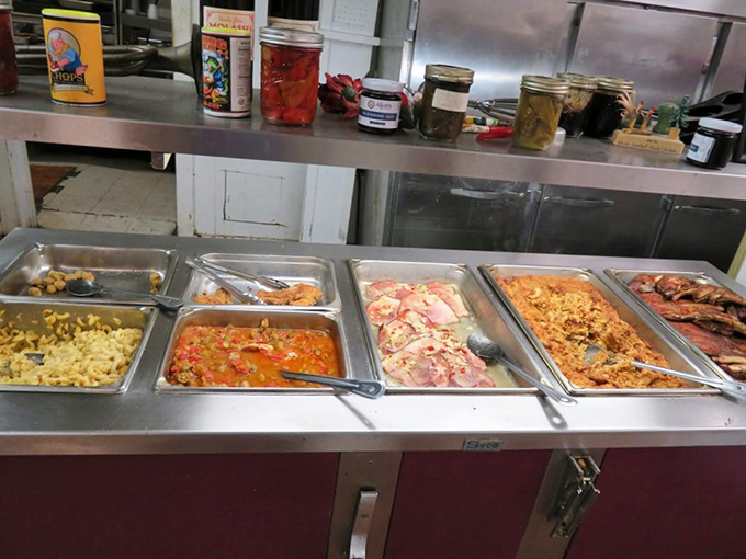 Buffet treasure hunt where every pan holds gold. From creamy mac and cheese to savory meats, this spread is why elastic waistbands were invented.