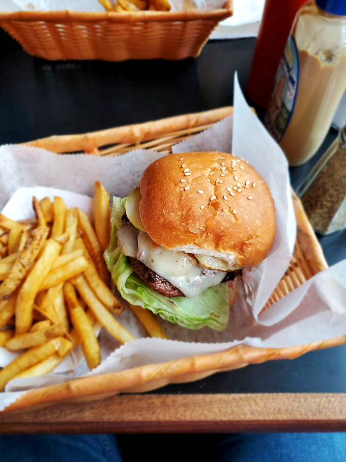 A perfect burger isn't complicated&mdash;just fresh ingredients stacked with architectural precision and served without pretension.