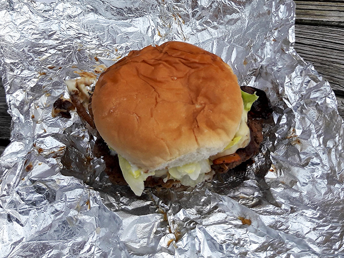 Wrapped in foil like a precious gift, this burger reveals itself layer by layer&mdash;each bite a perfect balance of beef, cheese, and fresh toppings.