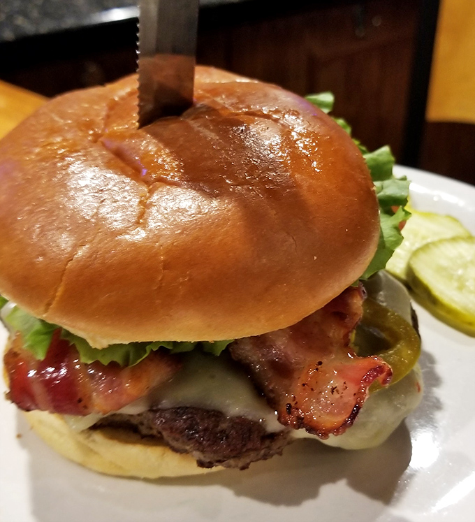 That bacon-topped burger sits there like it just won an award and knows it deserves every bit of recognition.