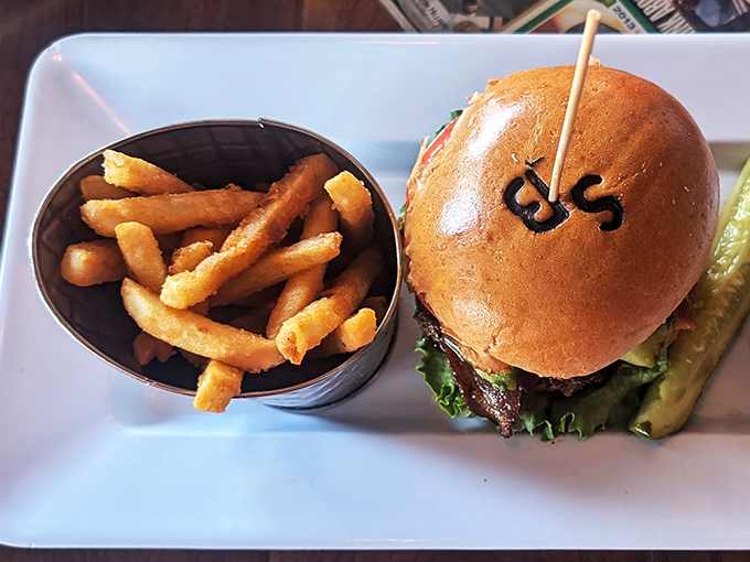 The burger arrives branded with the restaurant's initials &ndash; a delicious form of edible advertising that says, "Yes, we're that confident about our food."