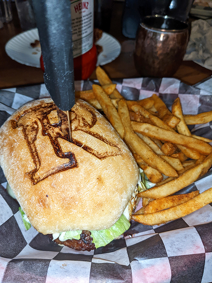 That "R" branded on the bun isn't just marking territory—it's a promise that this burger means serious business.
