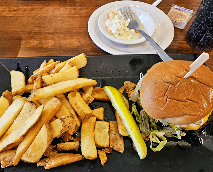 Who said breakfast places can't do lunch? These golden potato wedges and perfectly stacked burger prove that breakfast joints can moonlight as comfort food havens.