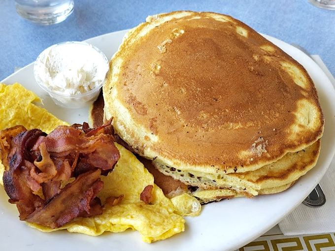 Pancakes so fluffy they practically hover above the plate, with bacon crisped to that magical point between chewy and crunchy.