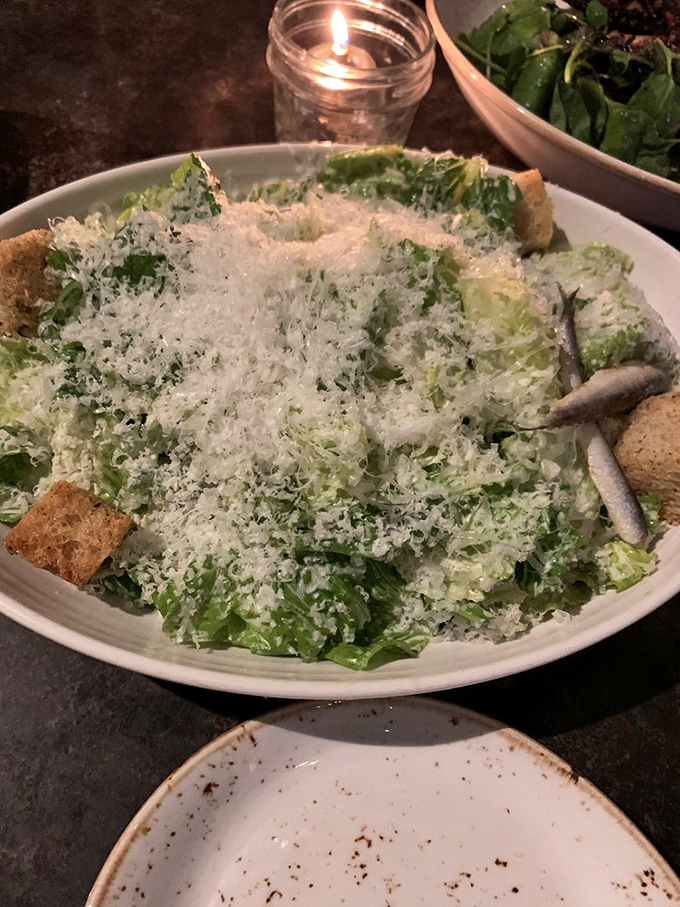 A Caesar salad that Julius himself would cross the Rubicon for. The mountain of Parmesan isn't just garnish&mdash;it's architecture.