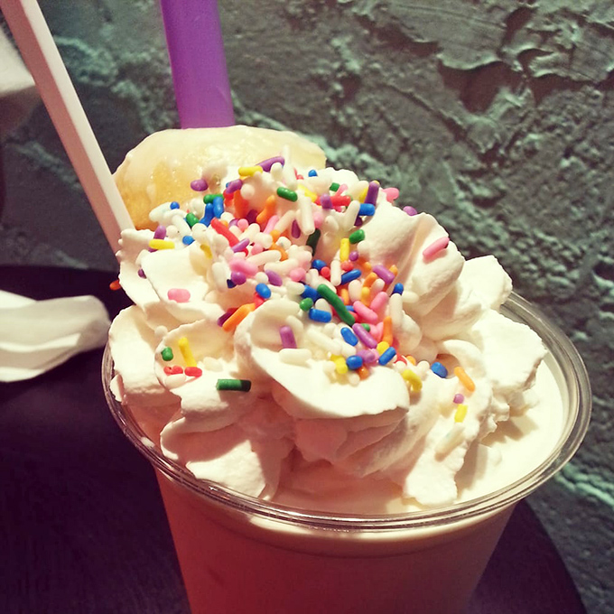 A shake crowned with rainbow sprinkles and whipped cream that would make even the most dedicated dieter whisper, "Worth it."
