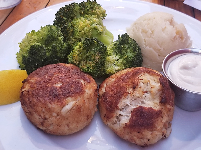 These crab cakes don't play hide-and-seek with the crab meat. Pure seafood satisfaction with minimal filler&mdash;like finding extra legroom in economy class.