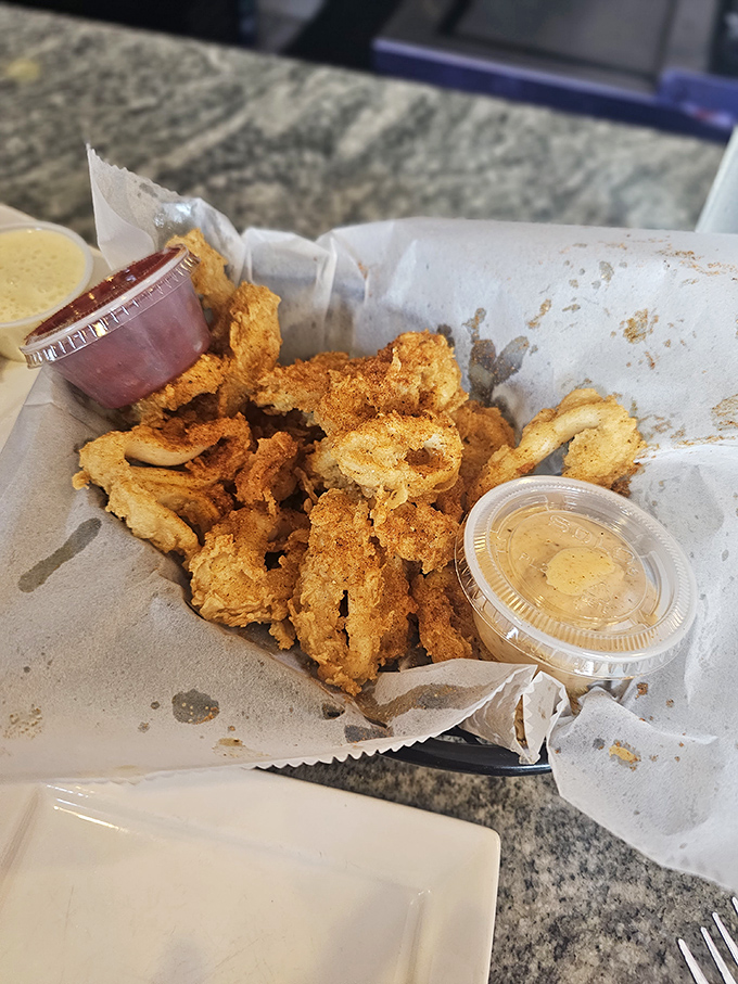Golden-fried calamari that's crispy enough to make even the most stoic Civil War general crack a smile, served with dipping sauces worth surrendering for.