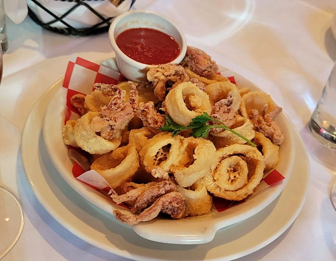 Crispy, golden calamari that shatters with each bite, served with marinara so fresh you'd think someone's Italian grandmother is hiding in the kitchen.
