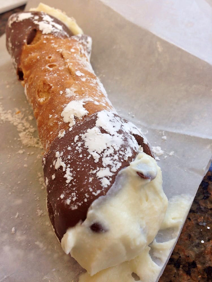 The humble cannoli &ndash; Sicily's gift to the world. That powdered sugar dusting isn't just for show; it's the dessert equivalent of a perfect snowfall.