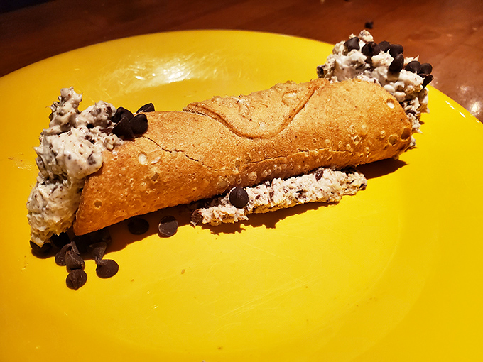 Cannoli shells piped with sweet ricotta and chocolate chips prove that dessert here isn't just an afterthought.